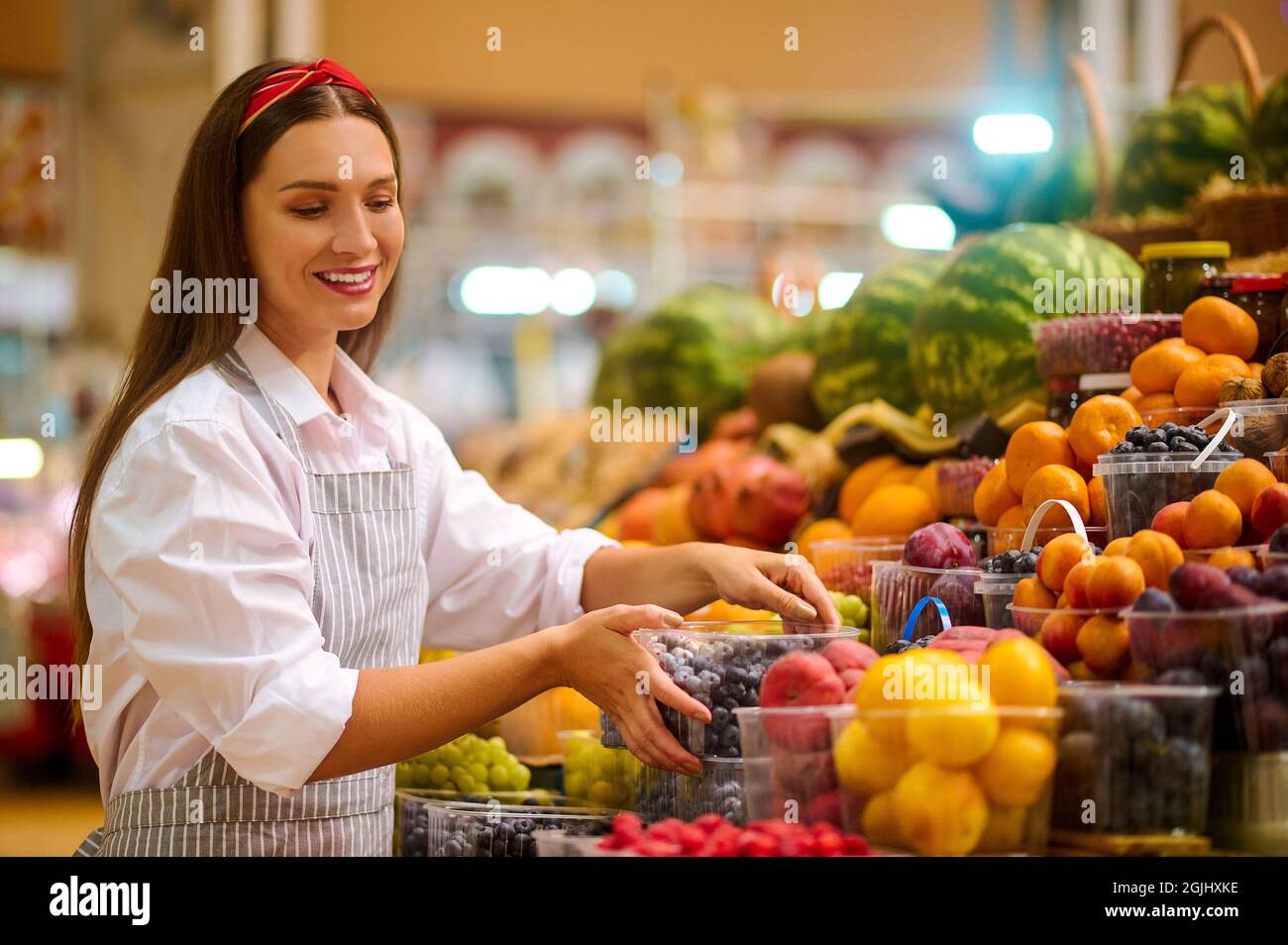 Colorful fruits food woman selling hi-res stock photography and images ...