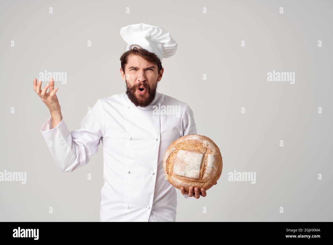 male cook Cooking bakery Professional emotions Stock Photo - Alamy