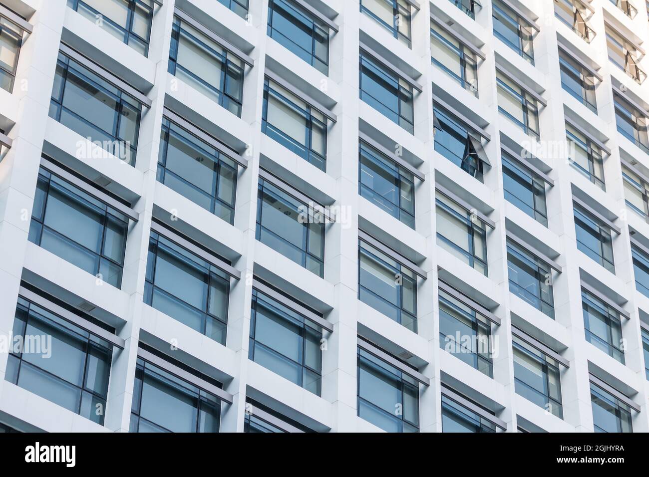 Office building windows background Stock Photo - Alamy
