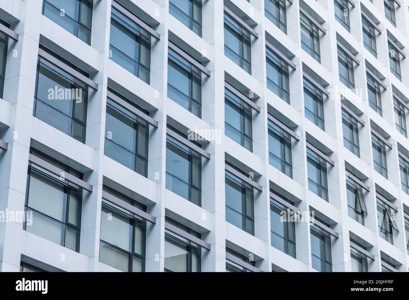 Office building windows background Stock Photo - Alamy