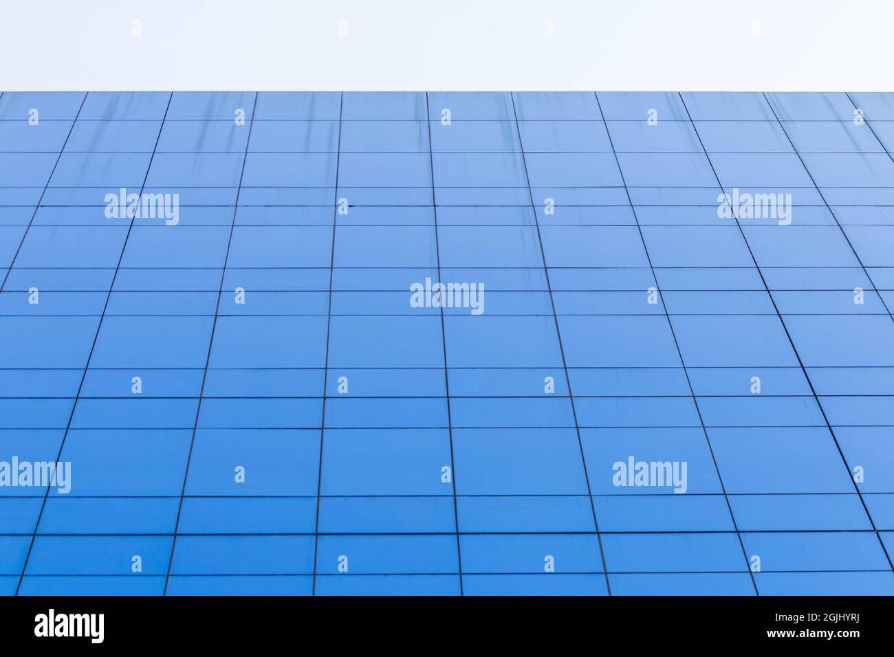 Blue Glass building Modern office building background Stock Photo - Alamy