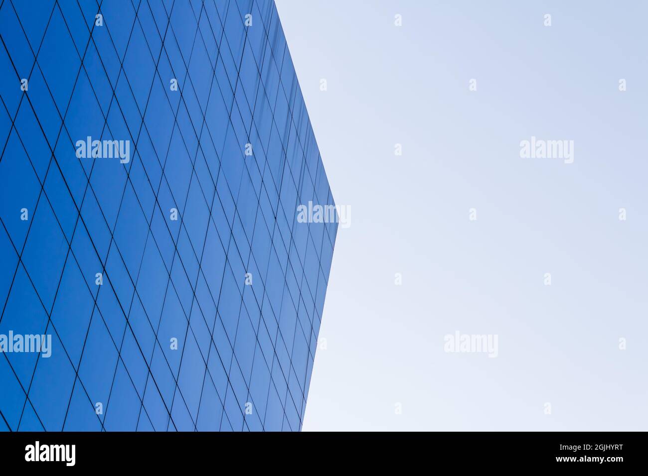 Blue Glass building Modern office building background Stock Photo - Alamy