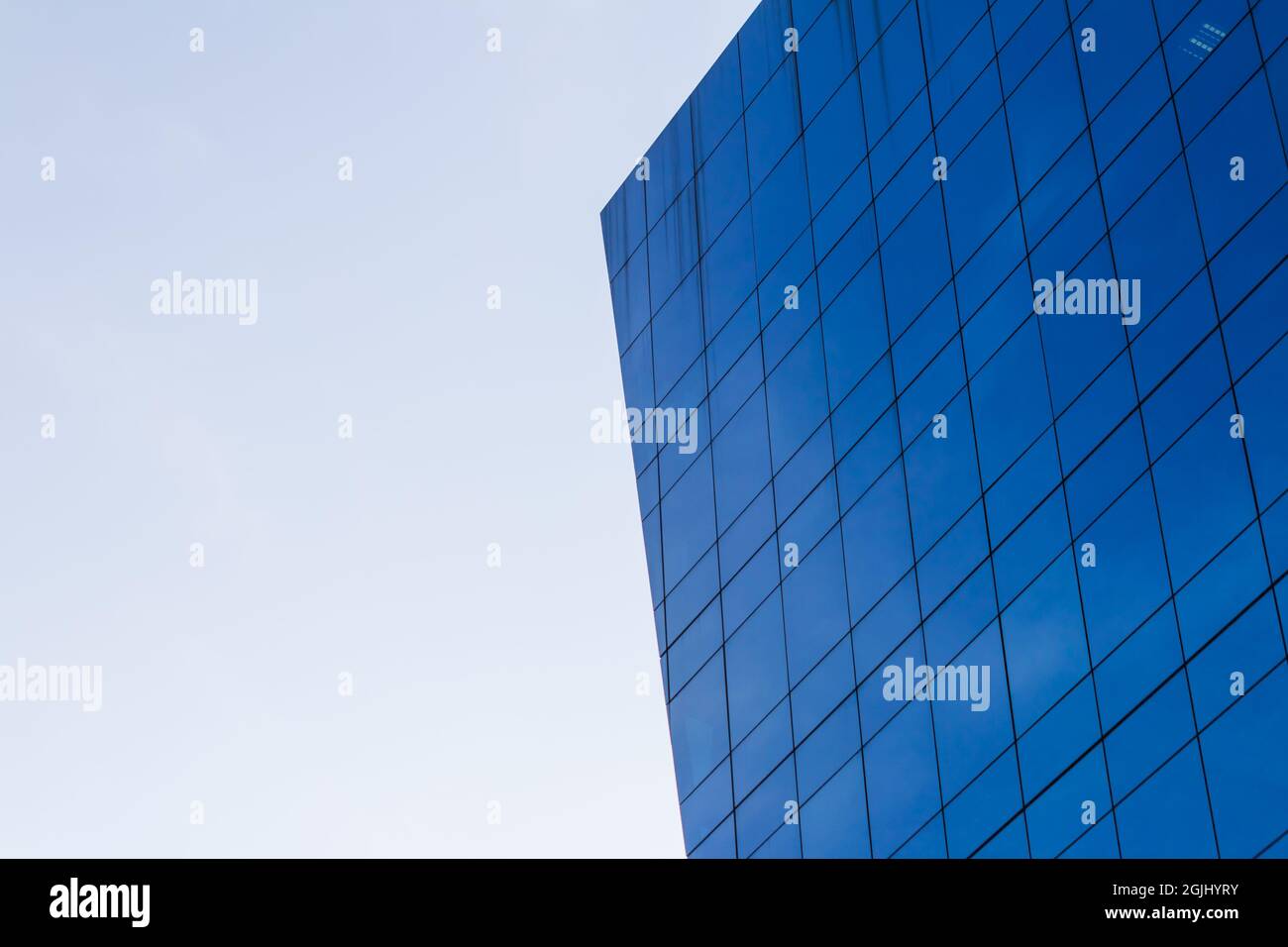 Blue Glass building Modern office building background Stock Photo - Alamy