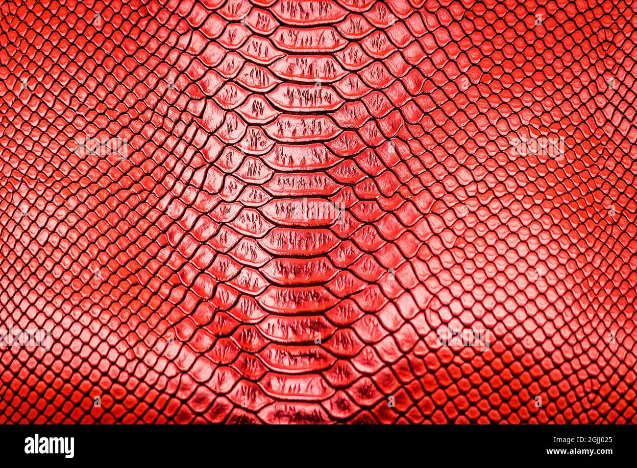 Red snake skin pattern texture background Stock Photo - Alamy