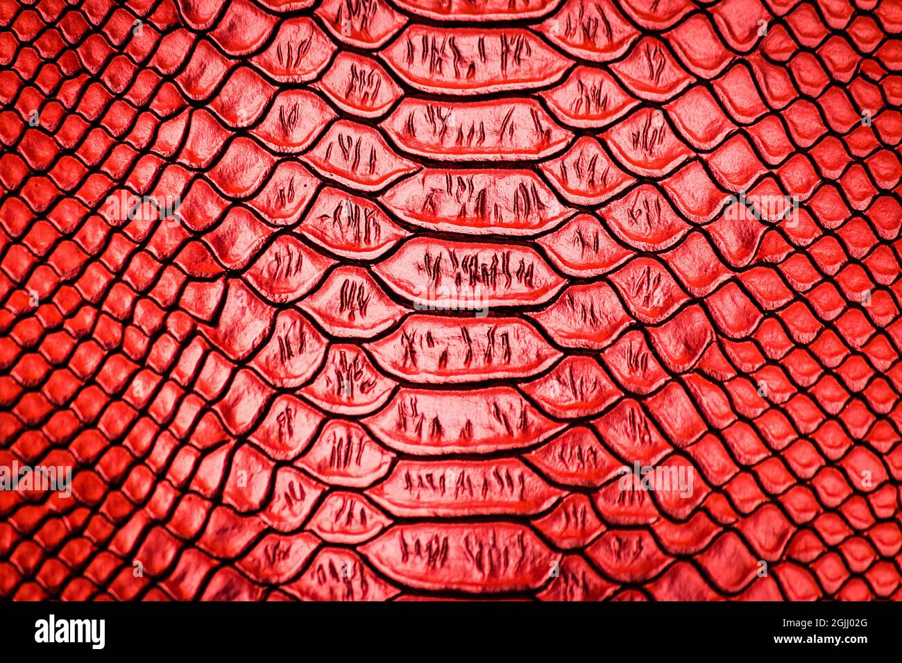 Red snake skin pattern texture background Stock Photo - Alamy