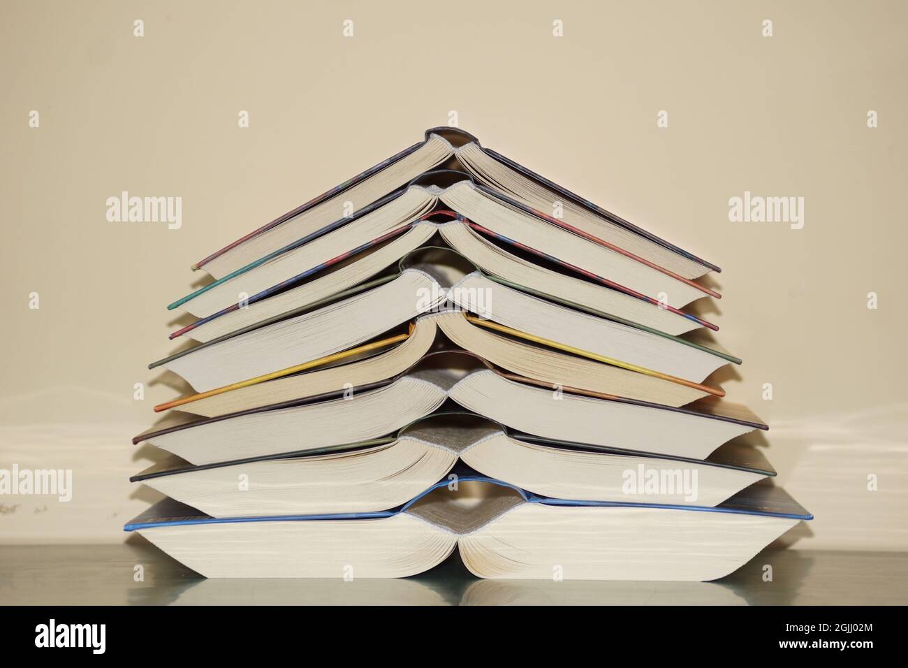 Stack of open books, with clipping path included Stock Photo - Alamy