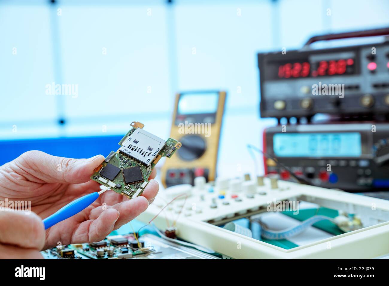 Repair of computer parts in a customer service laboratory Stock Photo ...