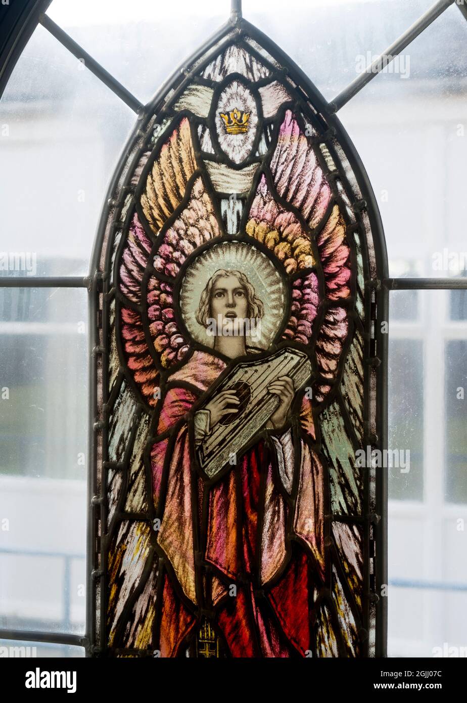 Stained glass panel of an angel playing a harp, Holy Trinity Church ...