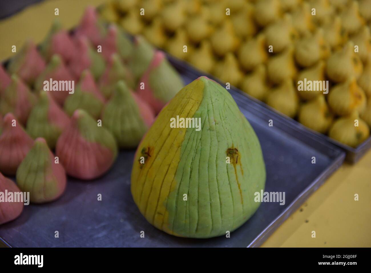 Kolkata, India. 09th Sep, 2021. Khoya modak, to offer the elephant ...