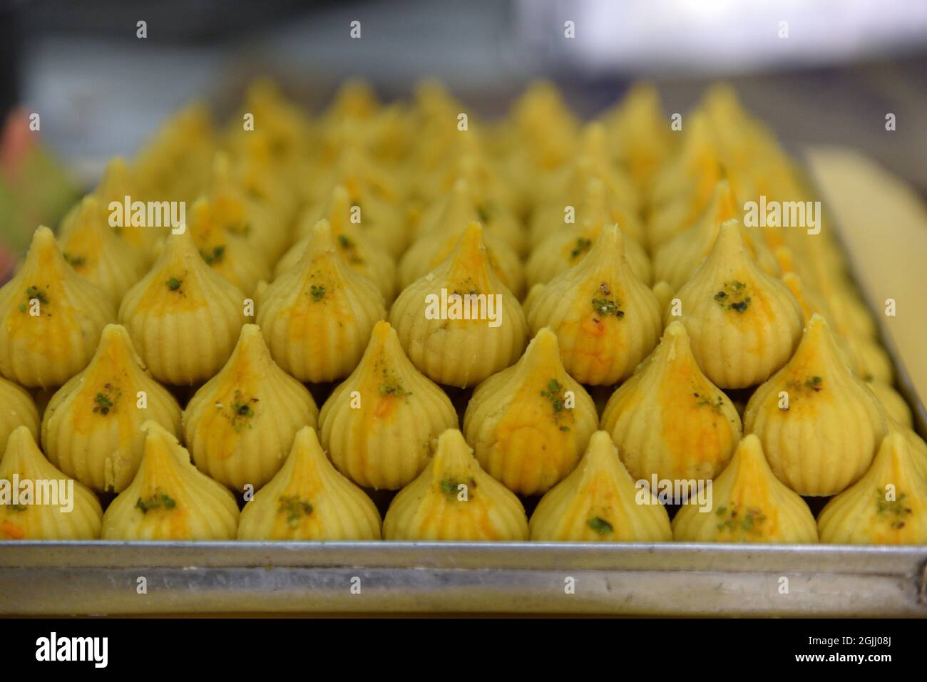 Kolkata, India. 09th Sep, 2021. Khoya modak, to offer the elephant ...