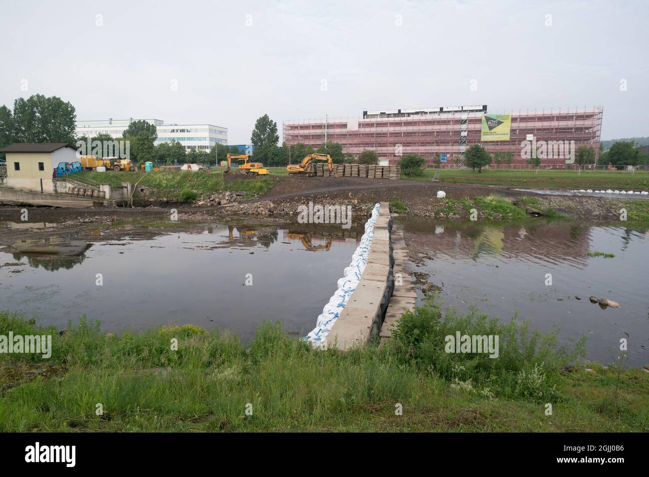 River dam repair construction works Stock Photo - Alamy
