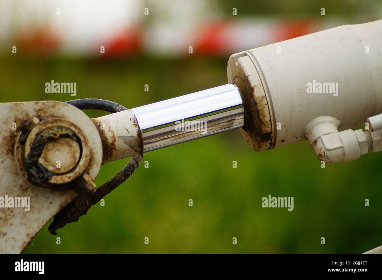 Hydraulic cylinder of a construction machine Stock Photo - Alamy