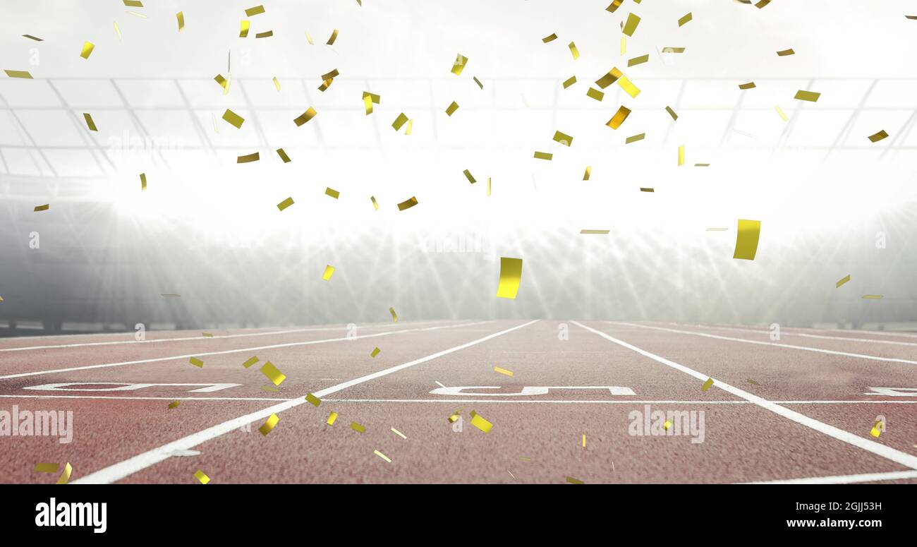 Digital image of golden confetti falling against sports stadium in ...