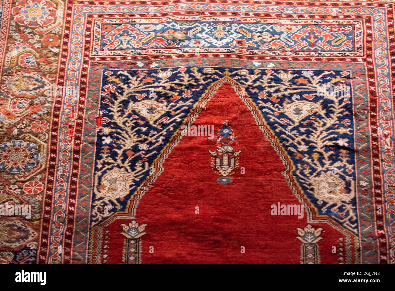 Old carpet with ancient design Stock Photo - Alamy