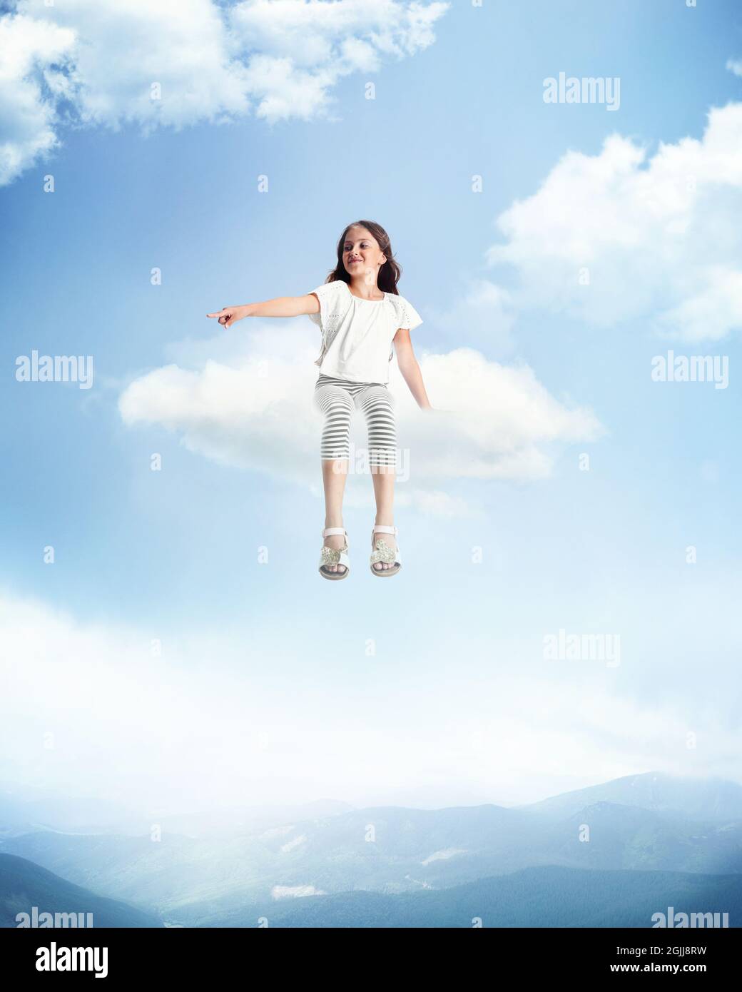 Creative artwork, collage with little beautiful girl sitting on white ...