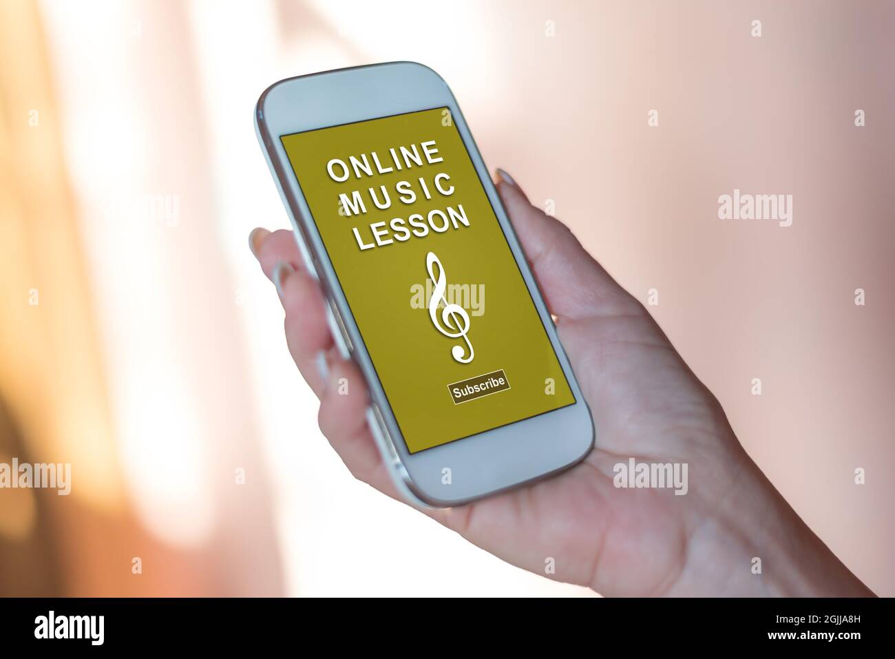 Smartphone screen displaying an online music lesson concept Stock Photo ...