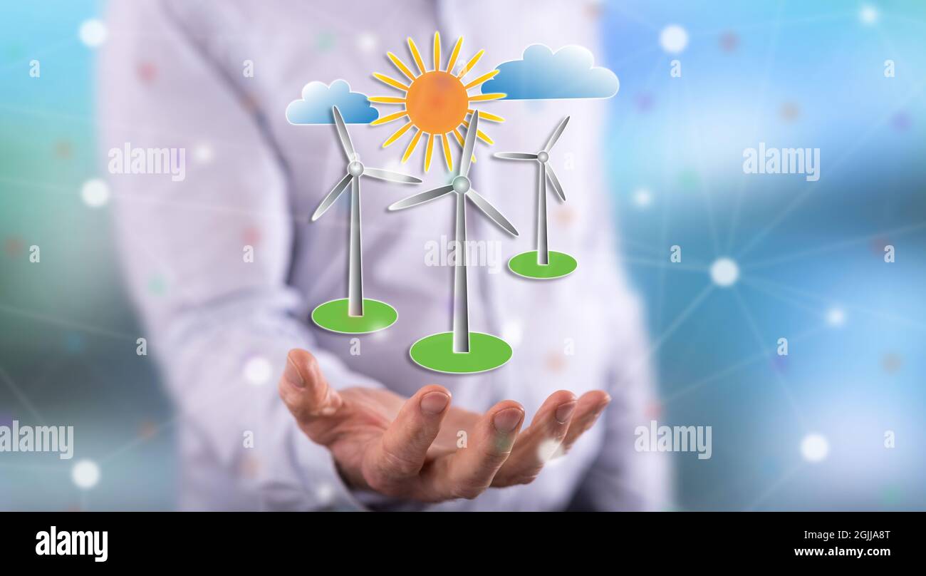 Clean energy concept above the hand of a man in background Stock Photo ...