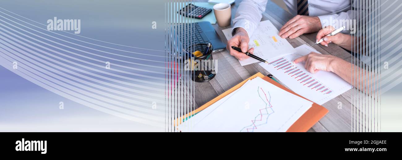 Two business people working together in office. panoramic banner Stock ...