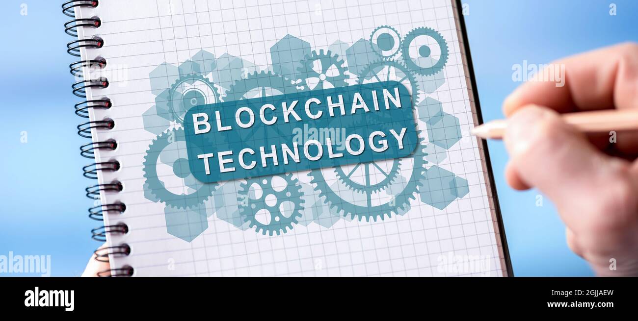Hand drawing blockchain technology concept on a notepad Stock Photo - Alamy
