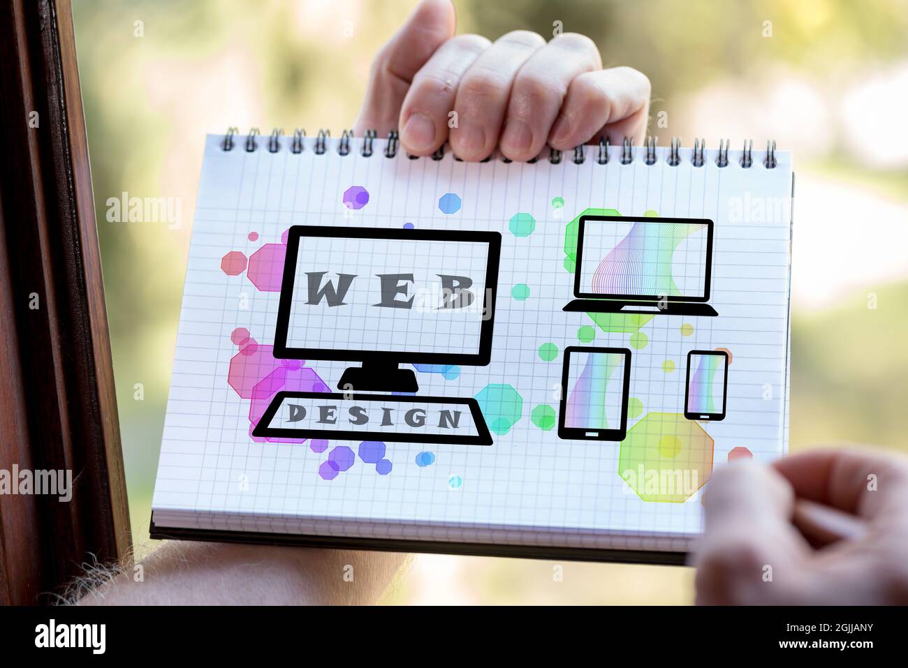 Hand drawing web design concept on a notepad Stock Photo - Alamy
