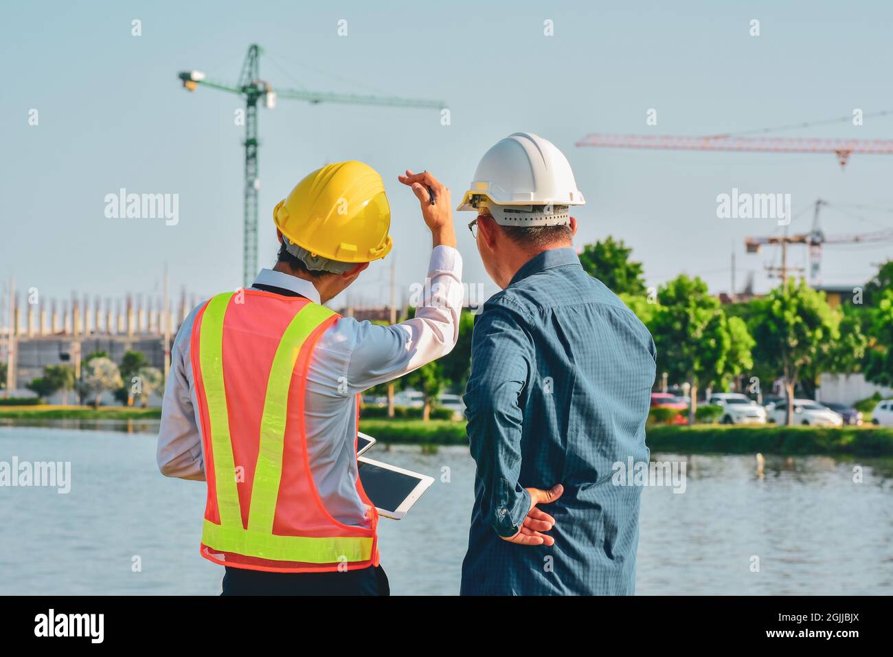 Male engineers talking construction project hi-res stock photography ...