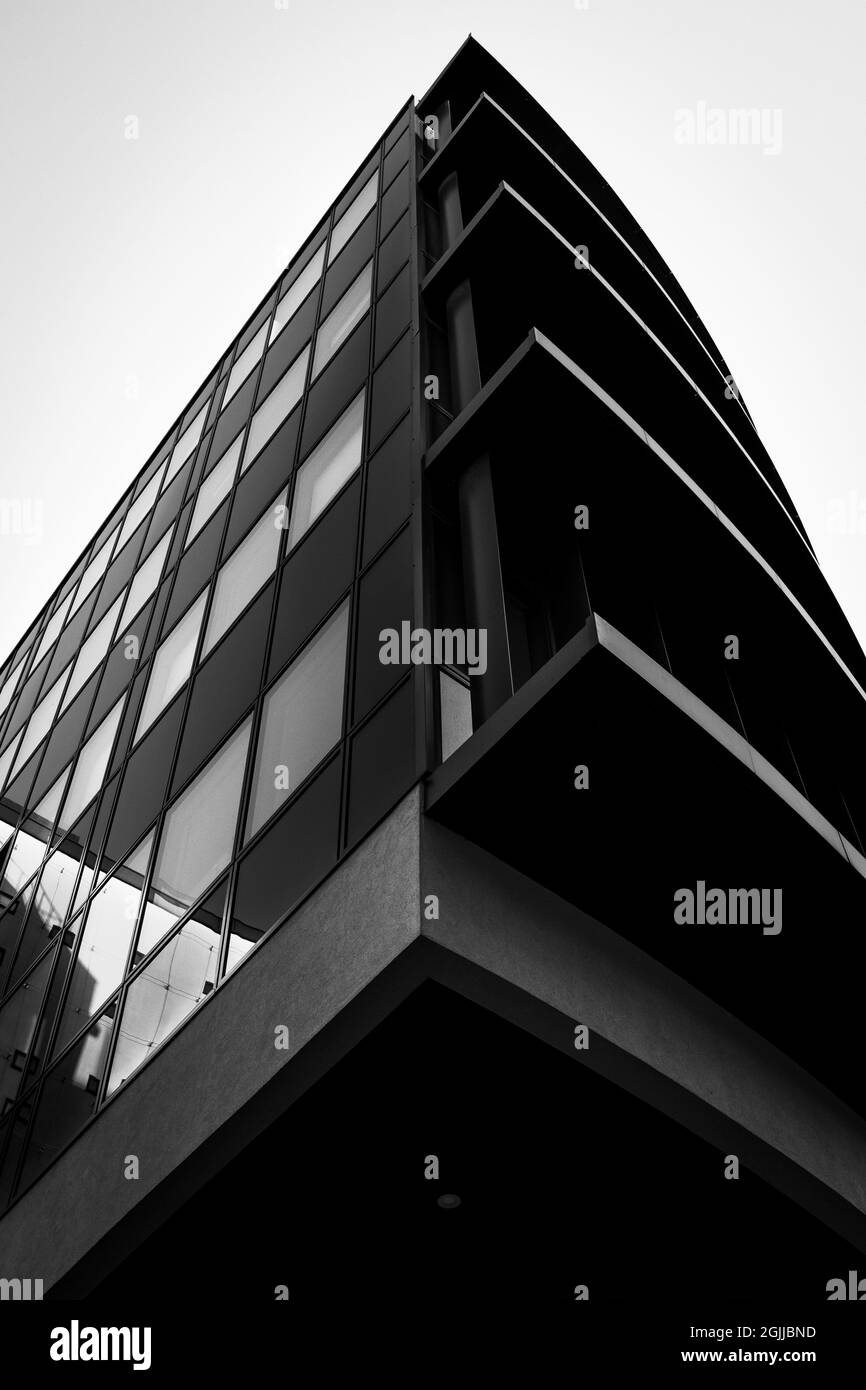 A modern building taken from a low angle view, with a contemporary ...