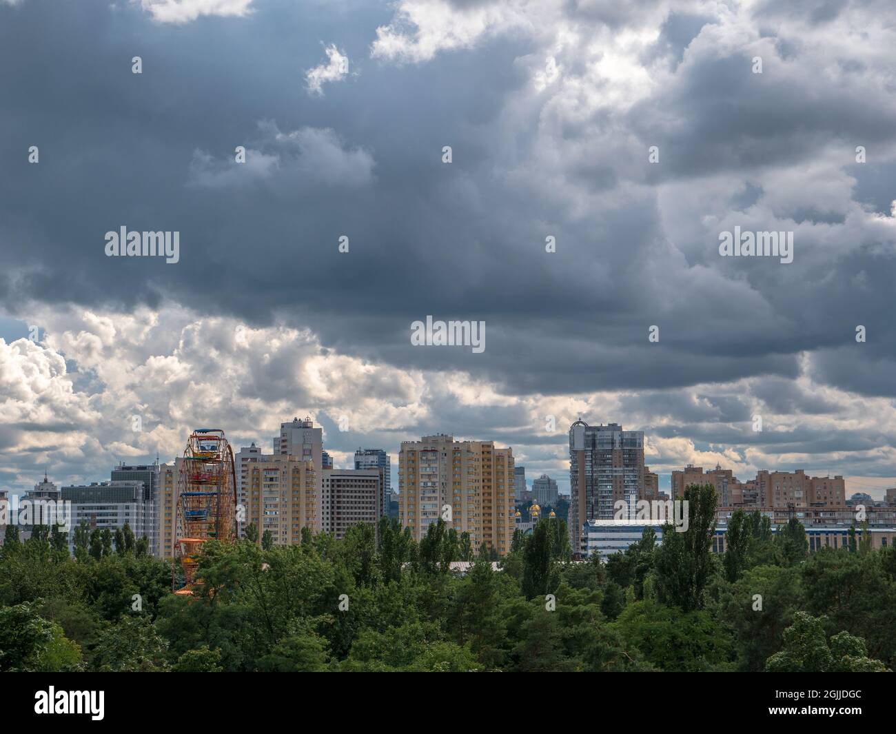 Low sky with dark cumulus storm thunder clouds above the high-rise ...