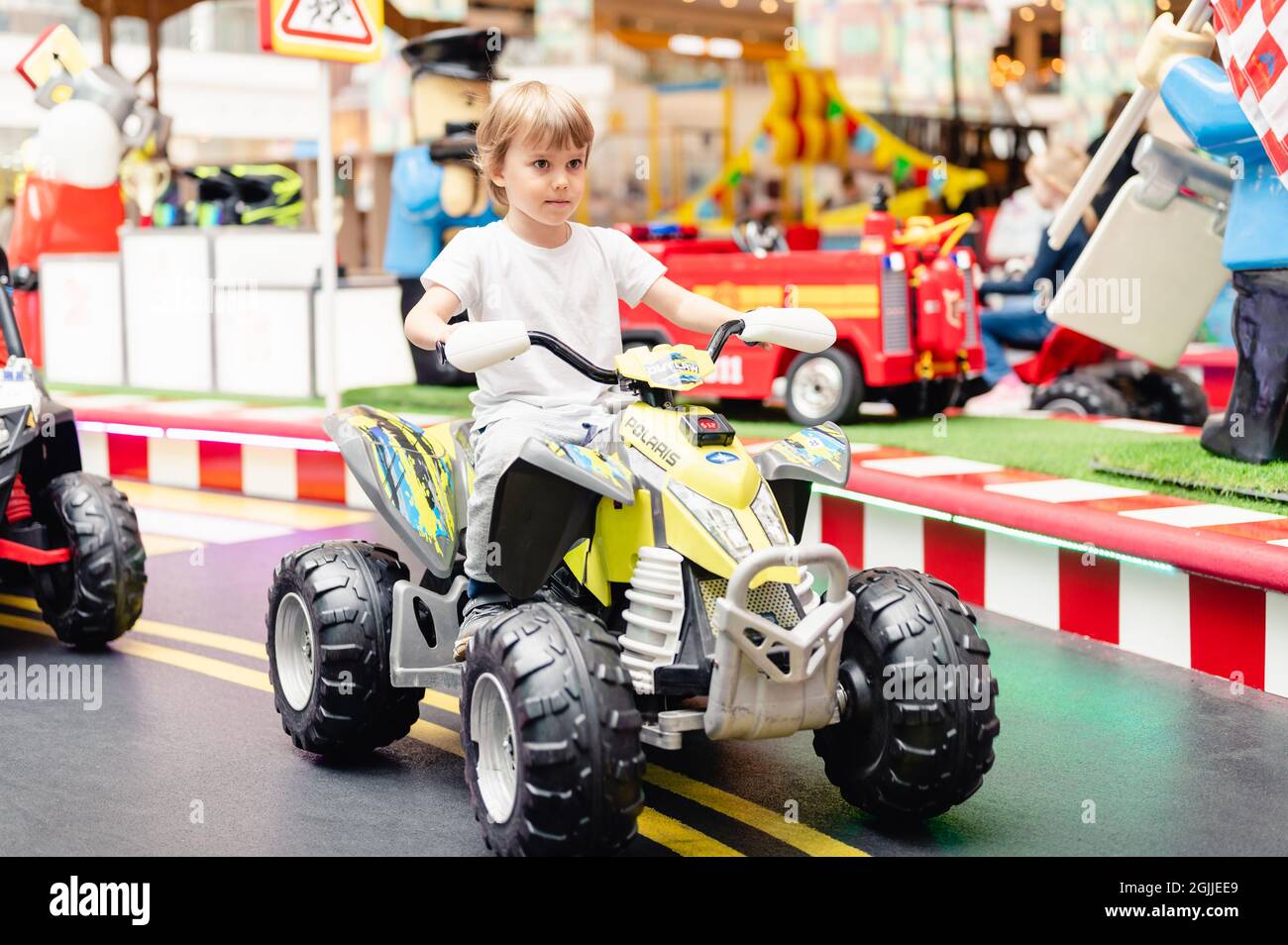 Moscow, Russia, 28 May 2021 - little happy kid boy fun riding an small ...