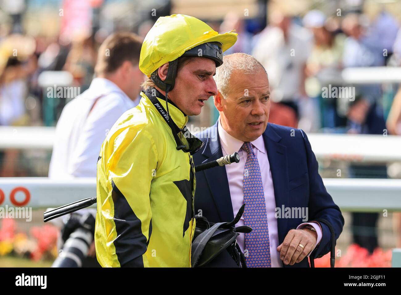 Jockey Adam Kirby with trainer Clive Cox after winning the Wainwright ...