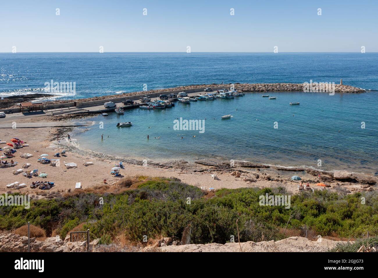 CAPE DEPRANO, CYPRUS, GREECE - JULY 23 : Beach and harbour at Cape ...