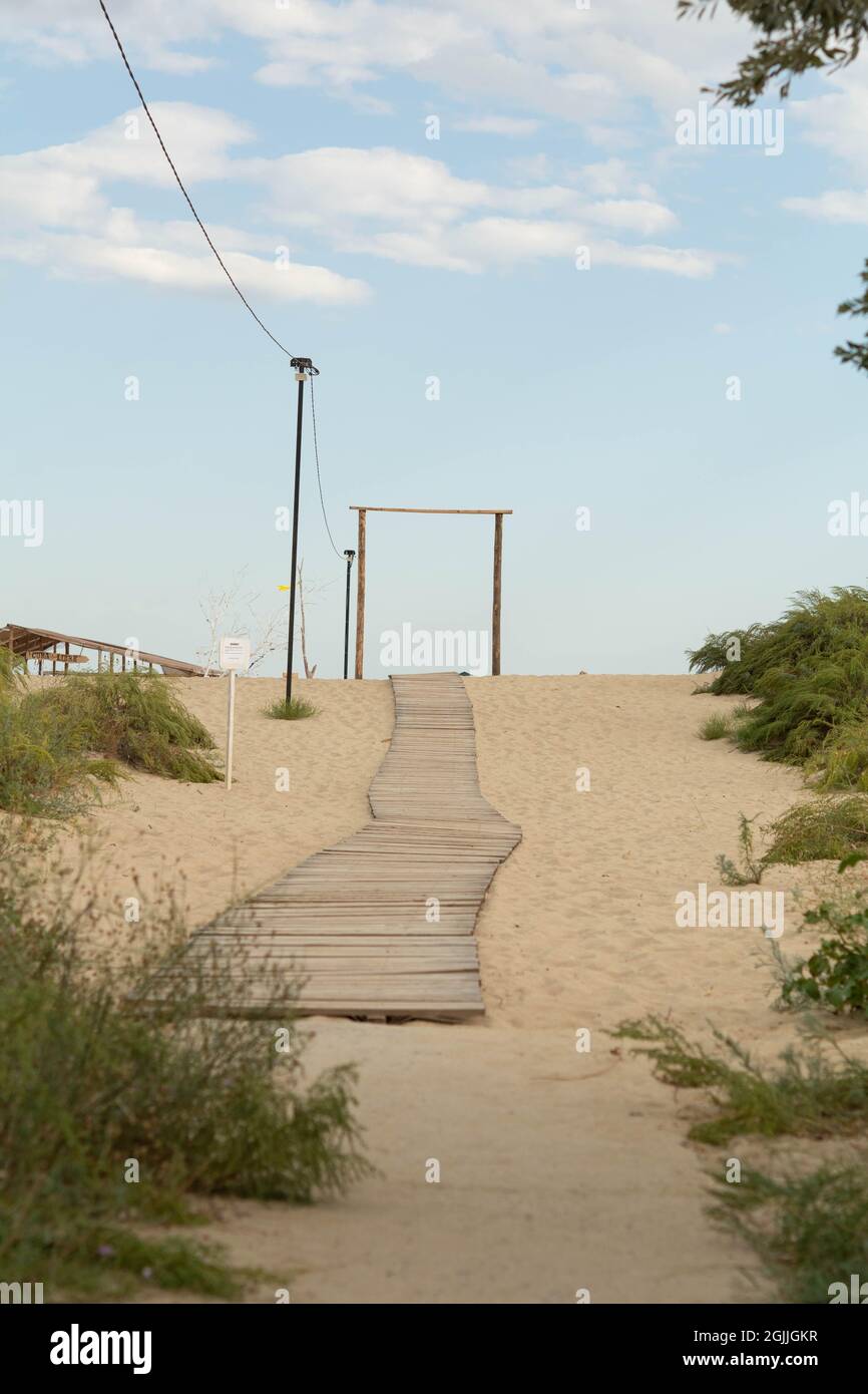View of a wooden walkway to access the beach in summer, Zatoka Beach ...