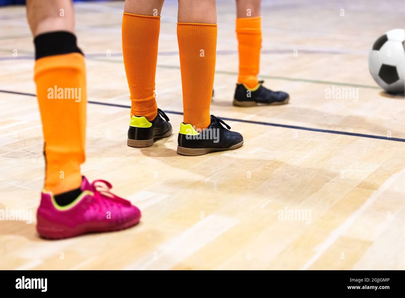 Boys in Soccer Clothes with Soccer Futsal Ball. Kid on indoor soccer ...