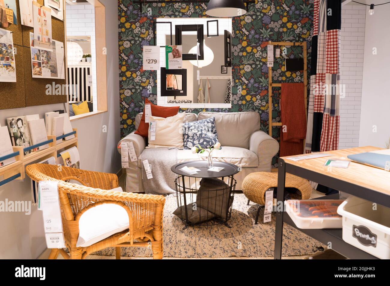 cosy room with sofa, armchair, coffee table, window Stock Photo - Alamy