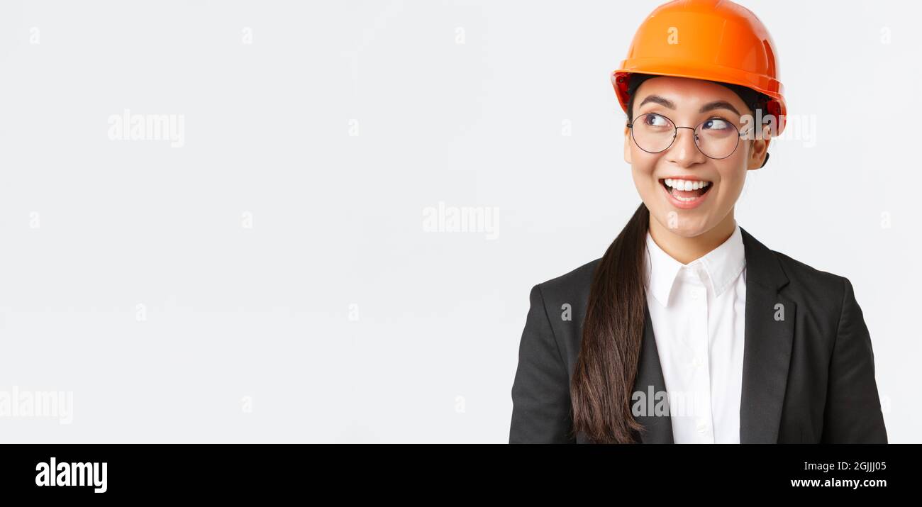 Close-up of creative asian female architect having interesting idea in ...