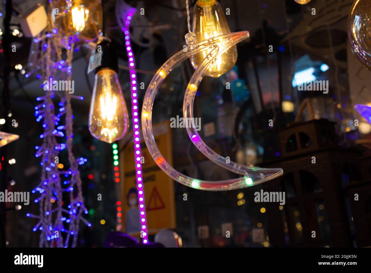 Interior lighting with bulbs, moon-shaped garlands and led lights Stock ...