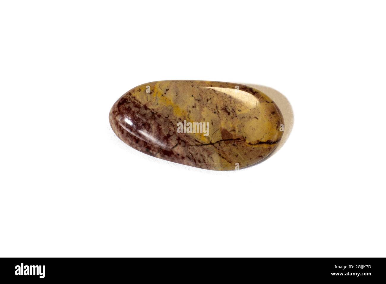 Red and multicolored jasper polished tumblestones narrow focus line ...