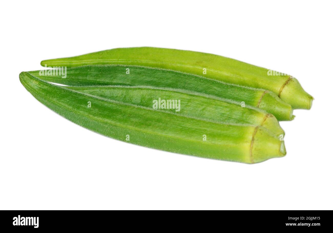 Fresh okras over white background Stock Photo - Alamy