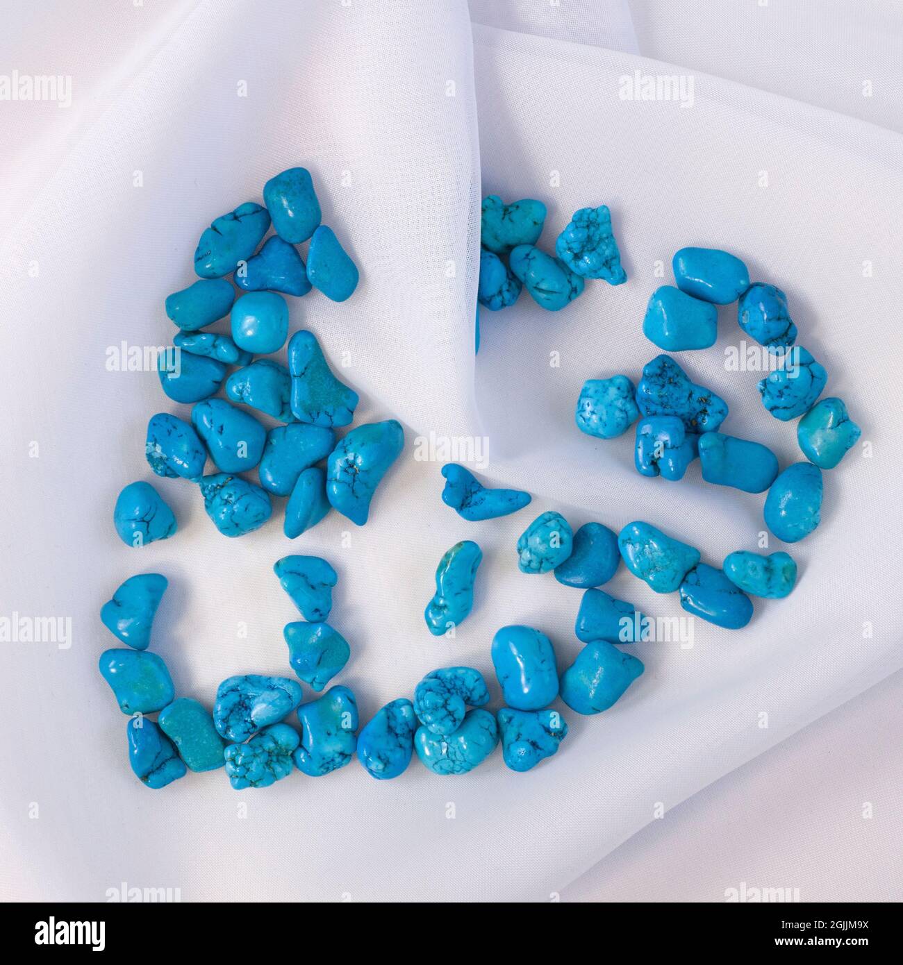 Turquoise jewel gemstones on black background, group of objects top ...