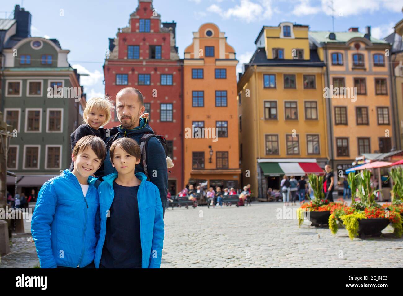 Young preschool child, visiting city of Stockholm with his family ...