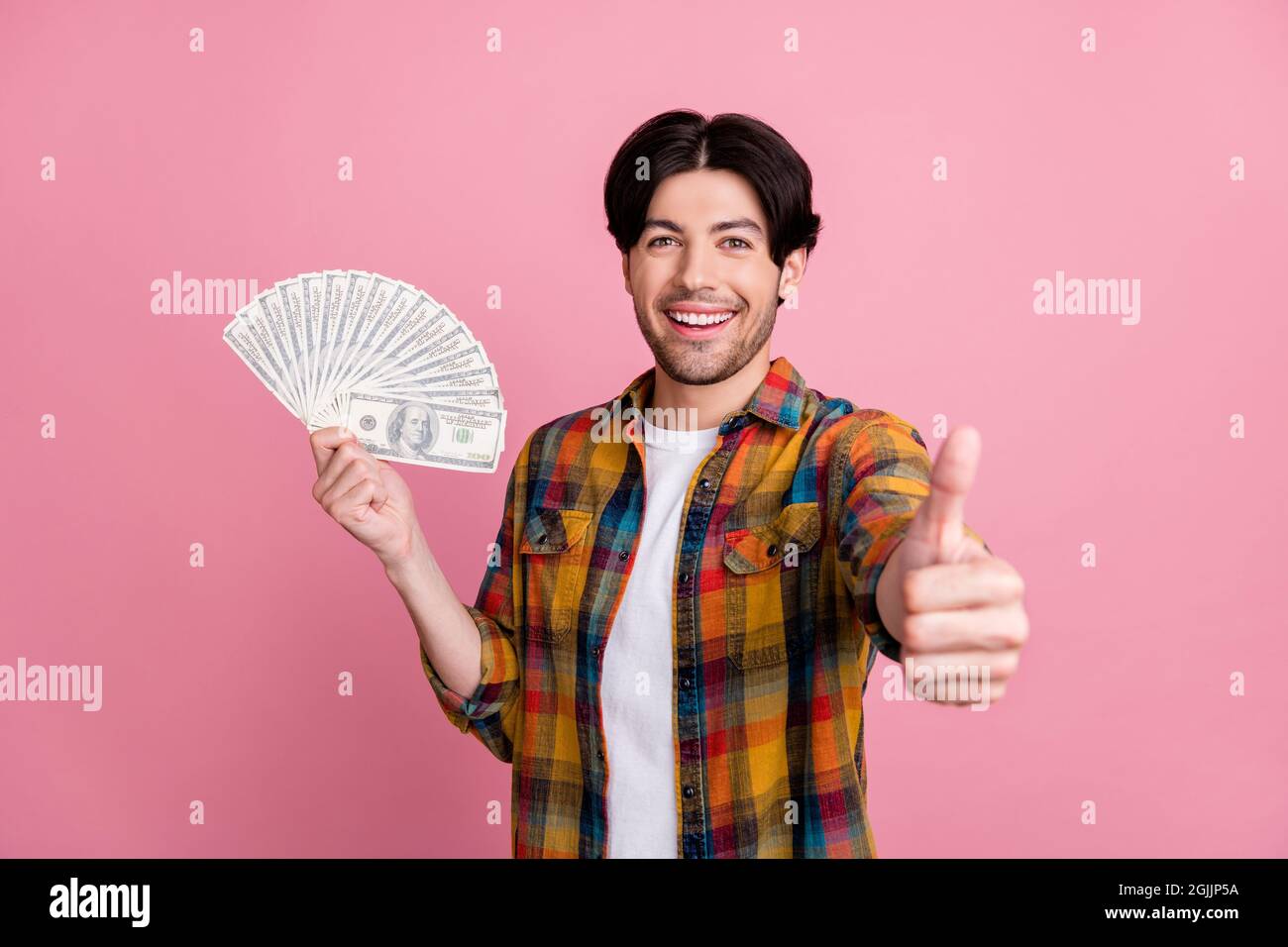 Photo of charming pretty young guy dressed checkered clothes holding ...