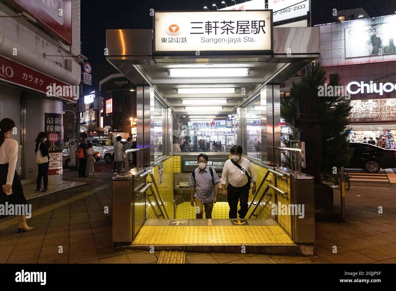 Tokyo, Japan. 10th Sep, 2021. Men wearing face masks exit the ...
