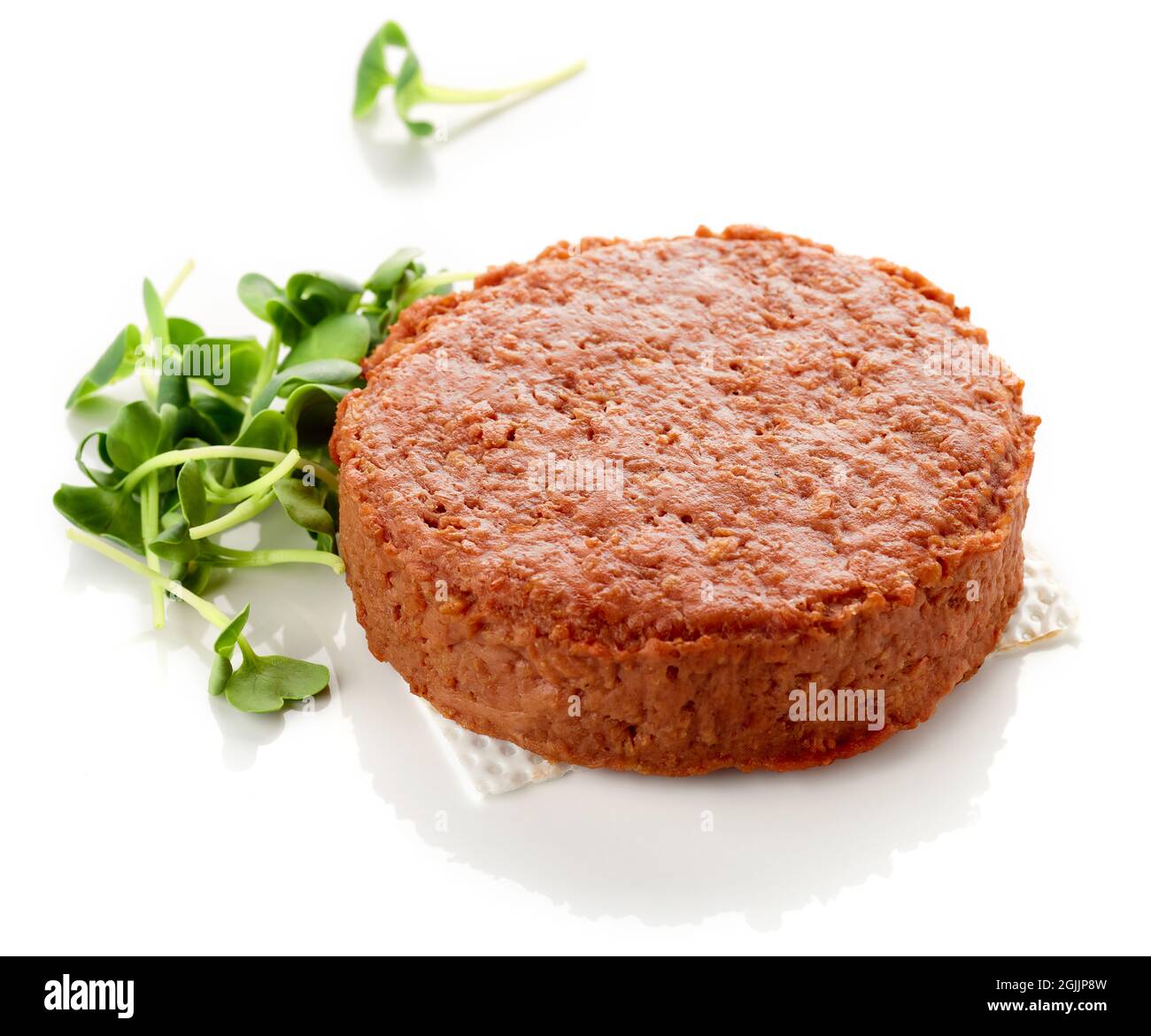 Plant based burger patty with grill marks isolated on white background ...