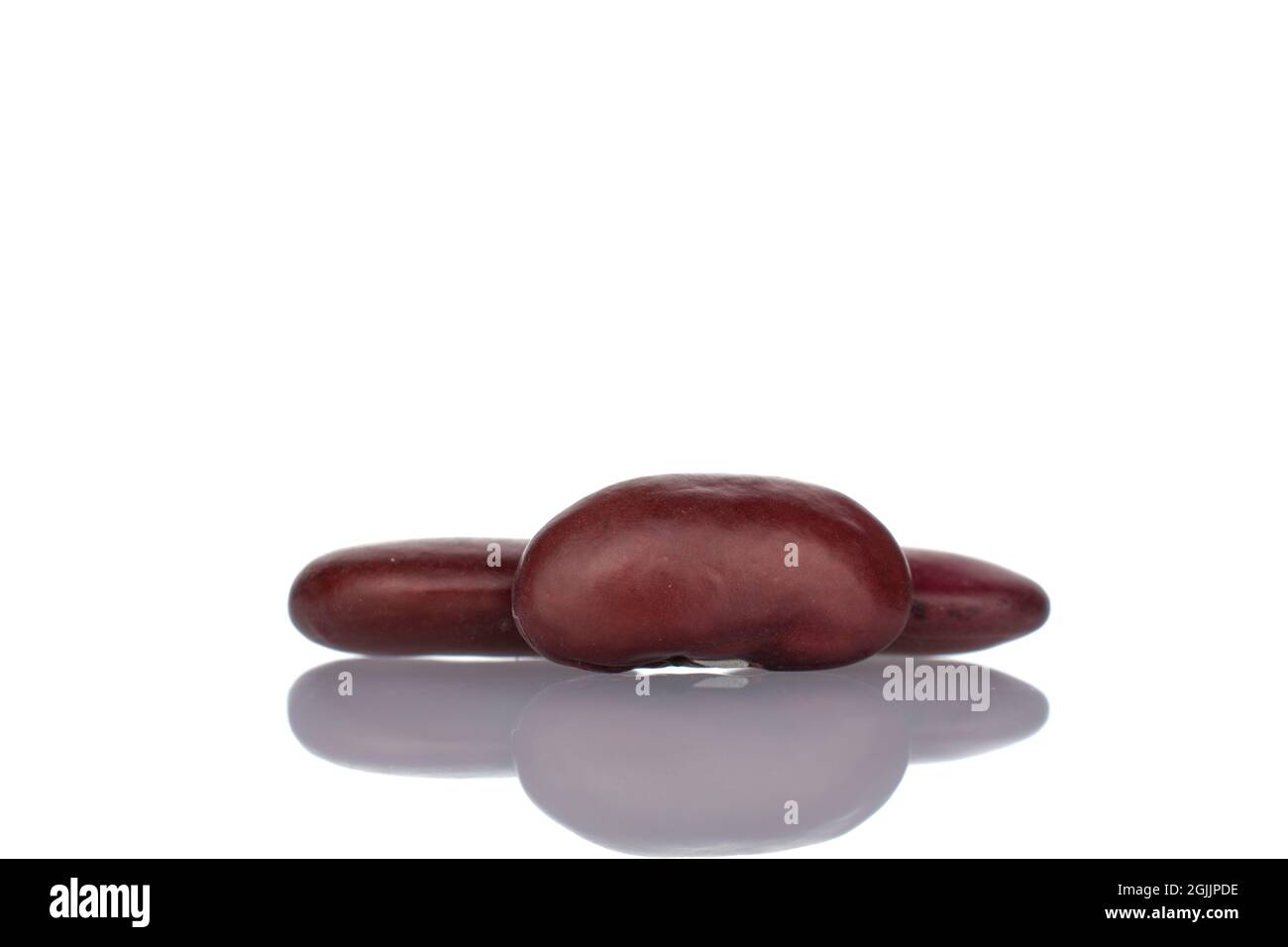 Three red beans on white hi-res stock photography and images - Alamy
