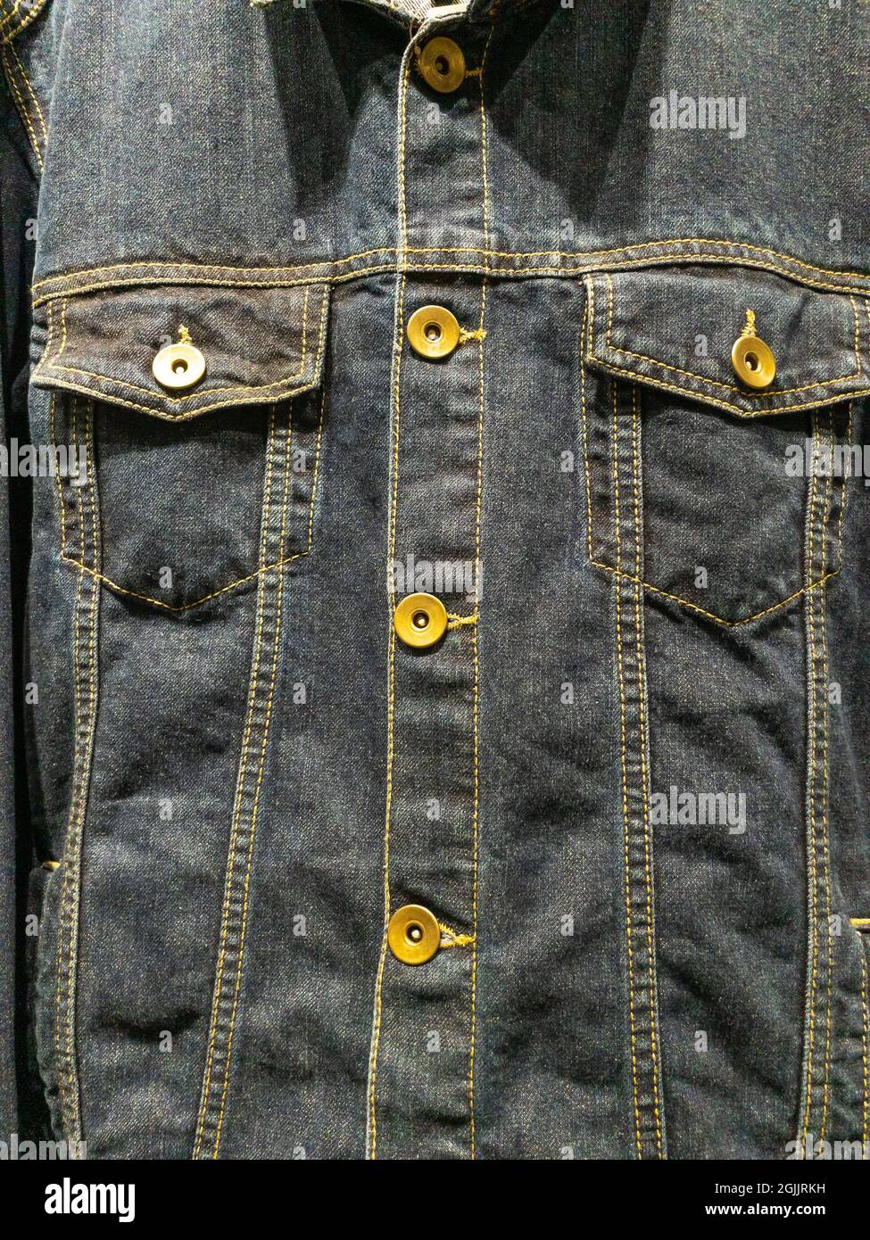 Front view of a blue Denim jacket with pockets and buttons Stock Photo ...
