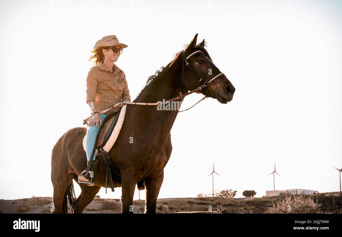 Young cowgirl and her horse hi-res stock photography and images - Alamy
