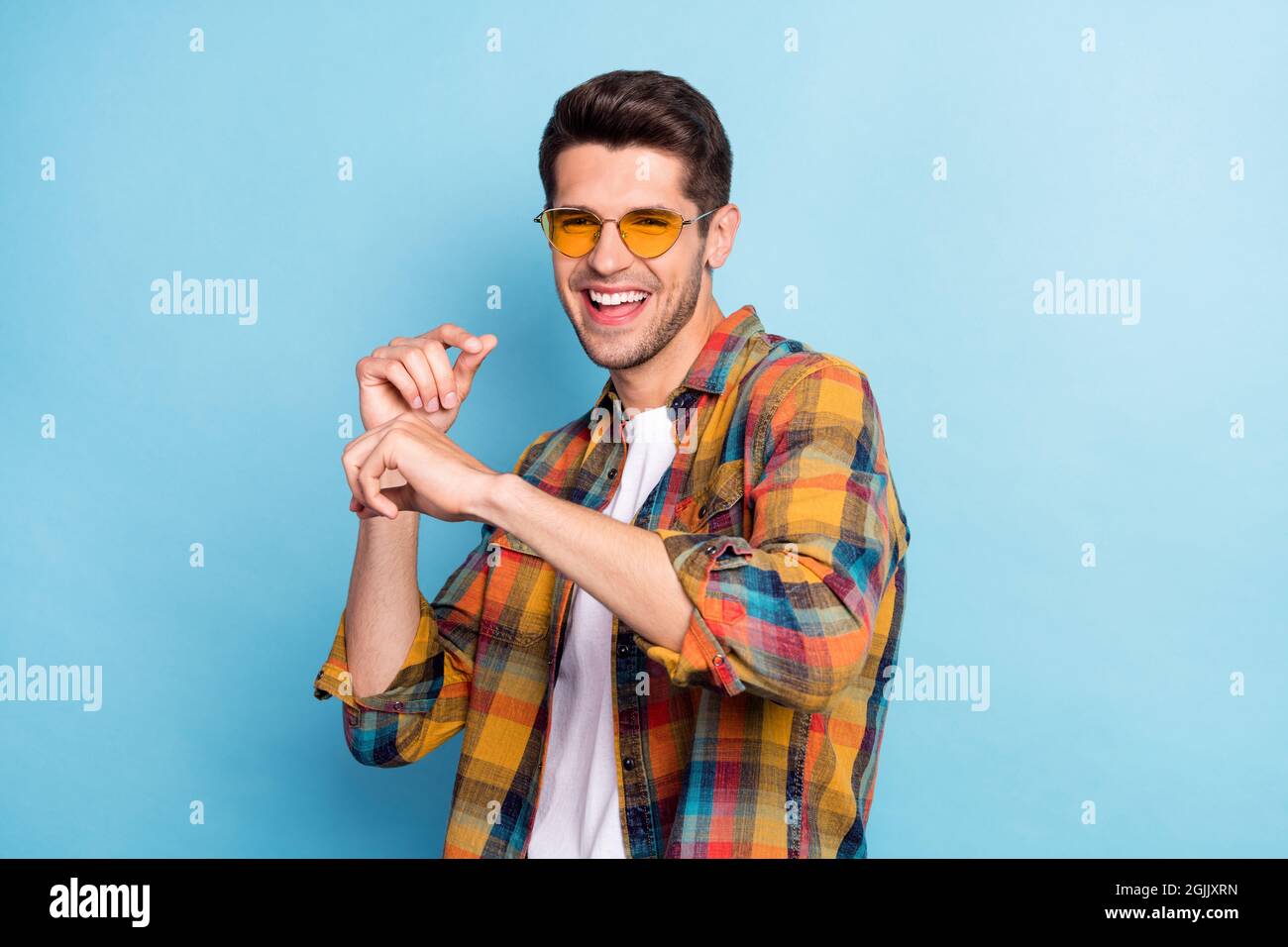 Portrait of attractive cheerful guy dancing having fun chill out free ...