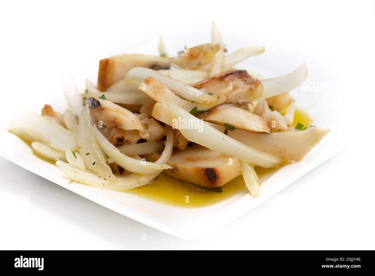 "Chocos aliñado", a typical food in Spain, cuttlefish in strips with ...