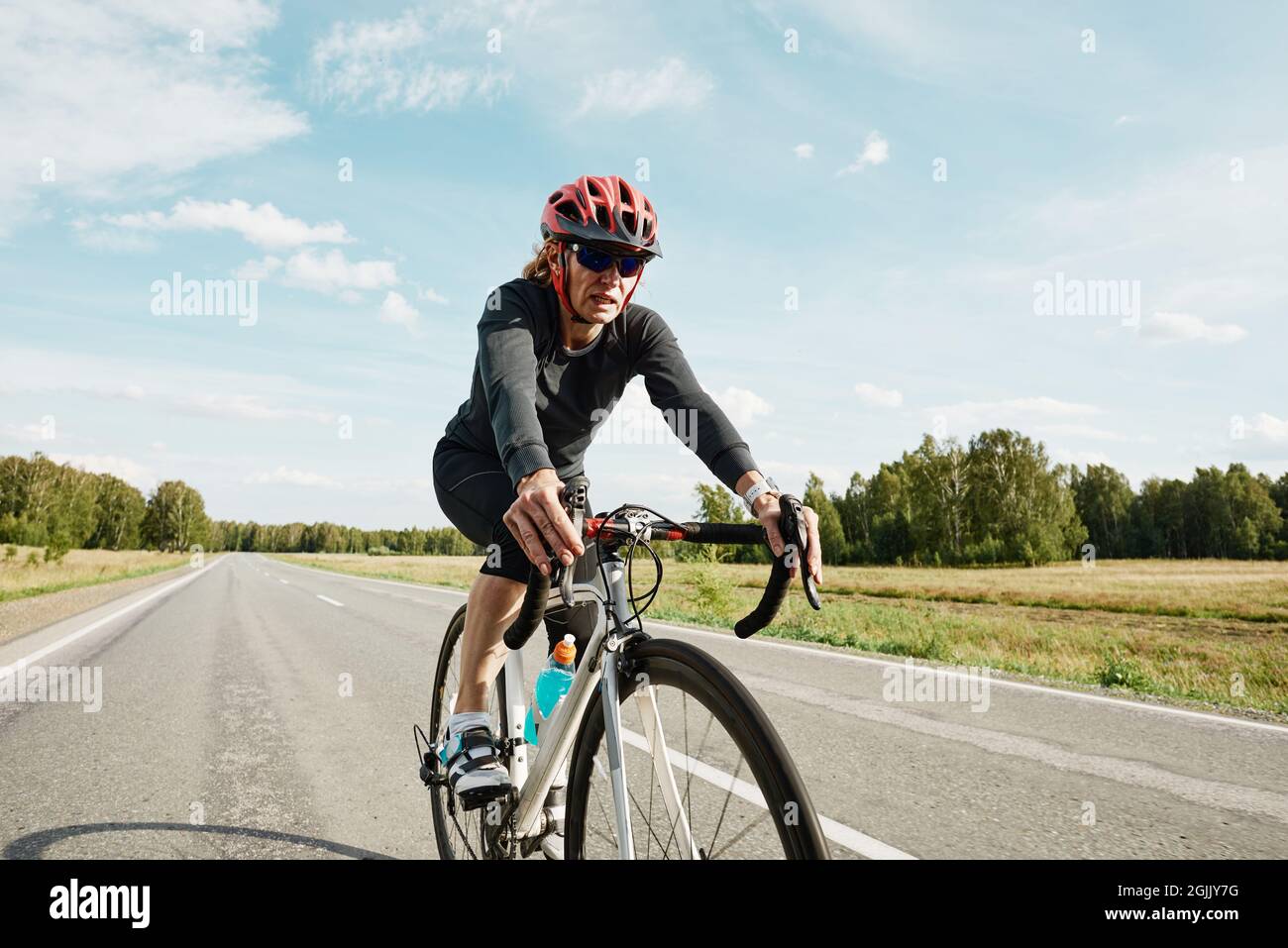 Female racing cyclist training hi-res stock photography and images - Alamy