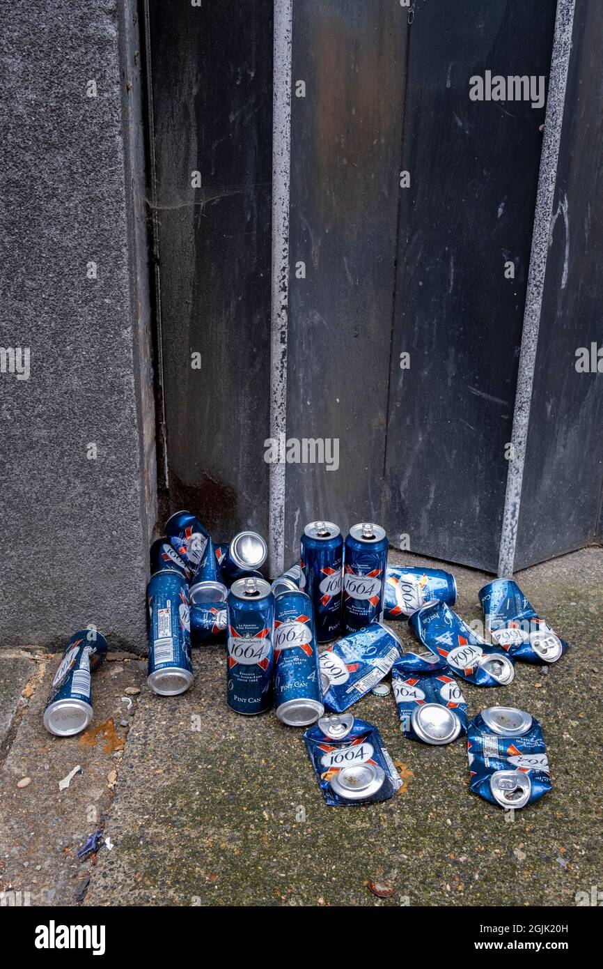A collection of discarded Kronenbourg 1664 extra-strength lager beer ...
