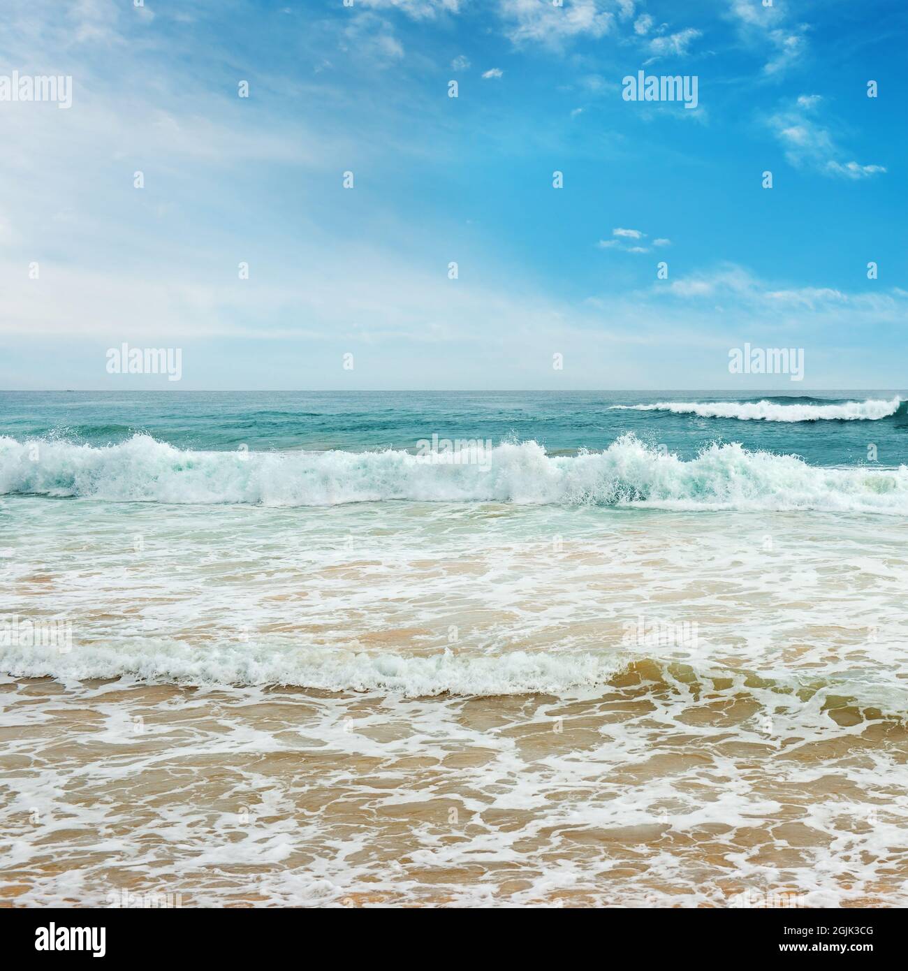 Ocean waves and blue sky Stock Photo - Alamy